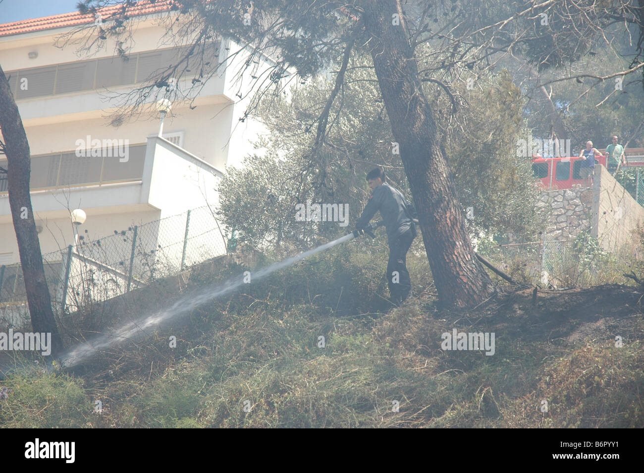 Firefighters near residential building hi-res stock photography and ...