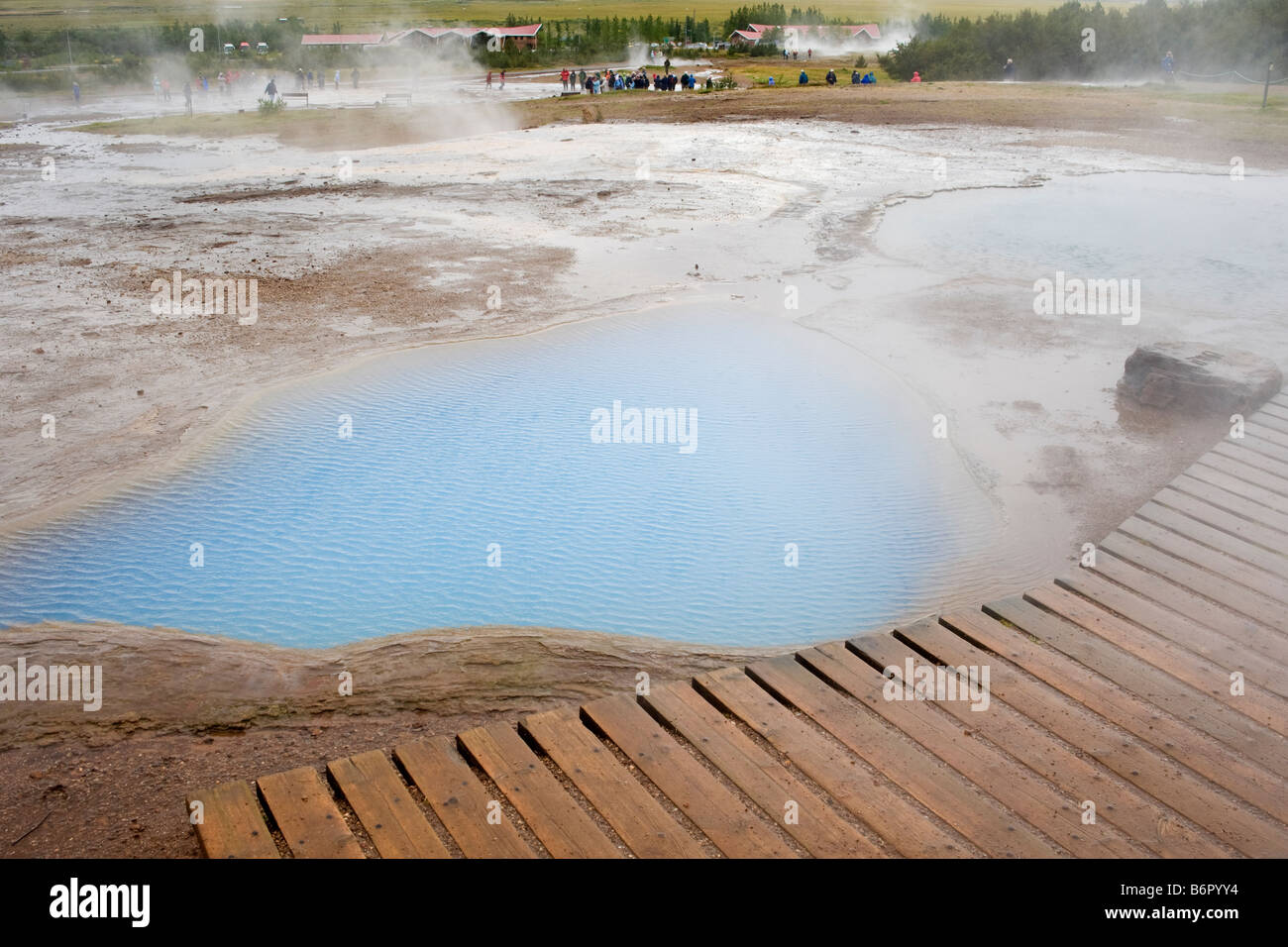 Hot spring pool of boiling water in Haukadalur Valley in southern ...