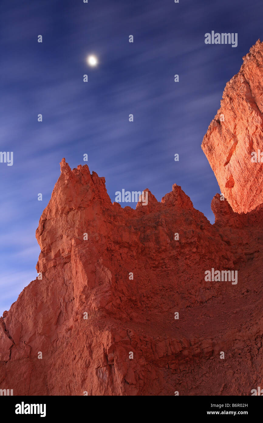 The moon sets behind moving clouds at Bryce National Park Stock Photo ...