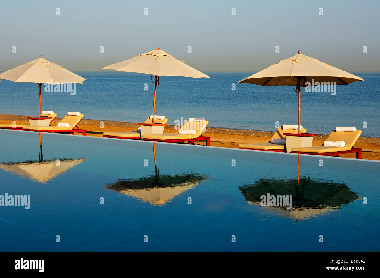 Luxurious hotel resort parasols swimming hi-res stock photography and ...
