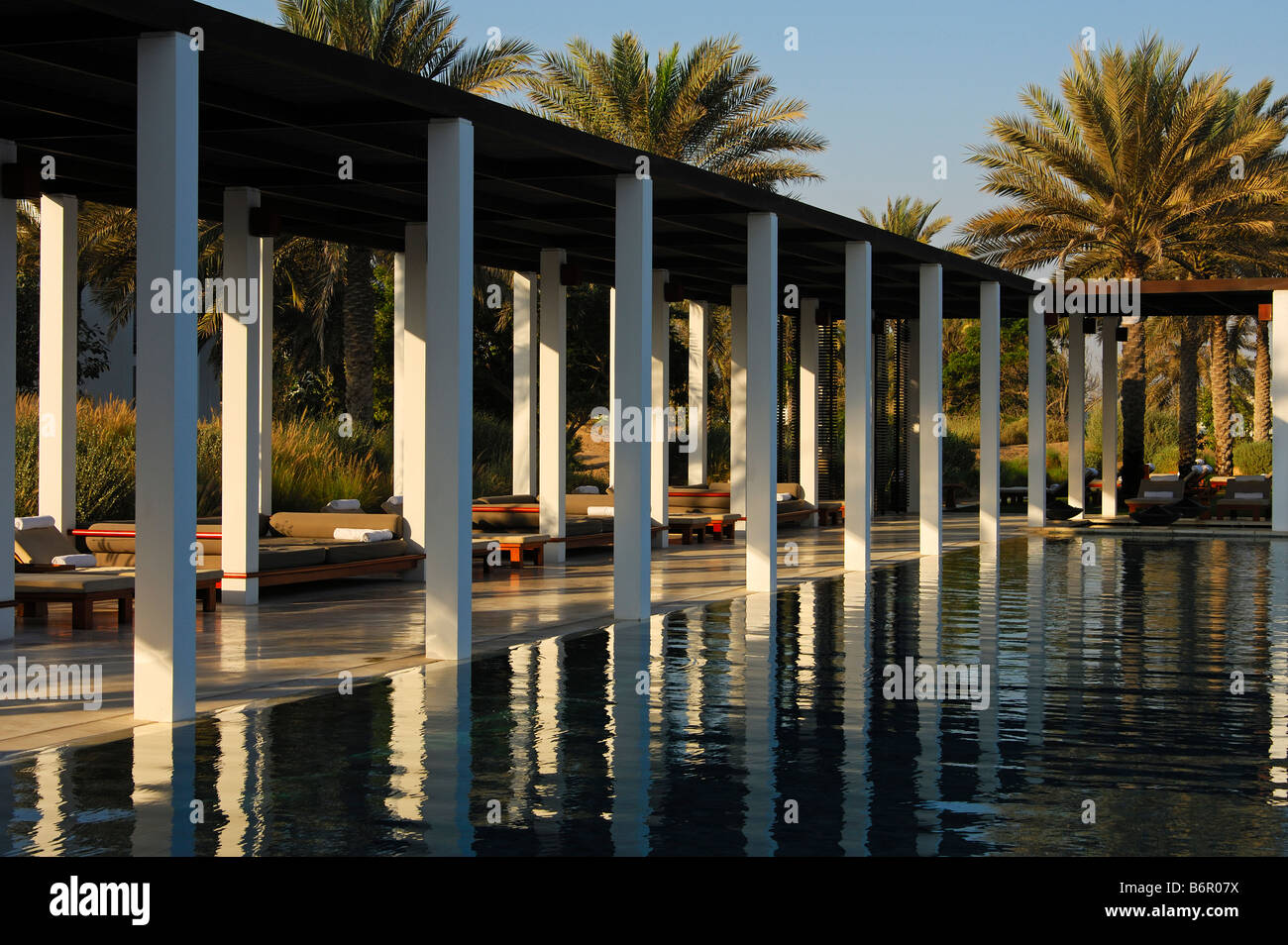Calm morning at the swimming pool, The Chedi Hotel Muscat, Sultanat of ...