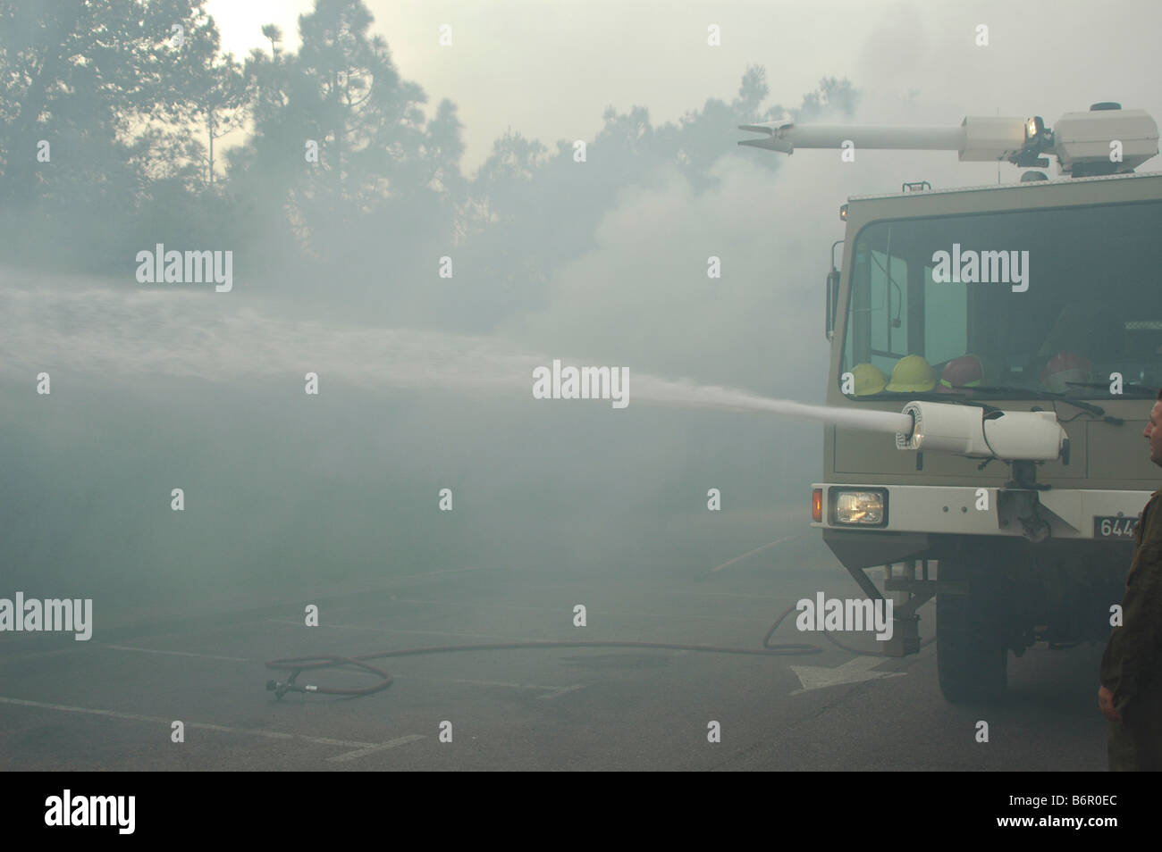 Israel Haifa Carmel Mountain Forest A fire engine cannon spraying water ...