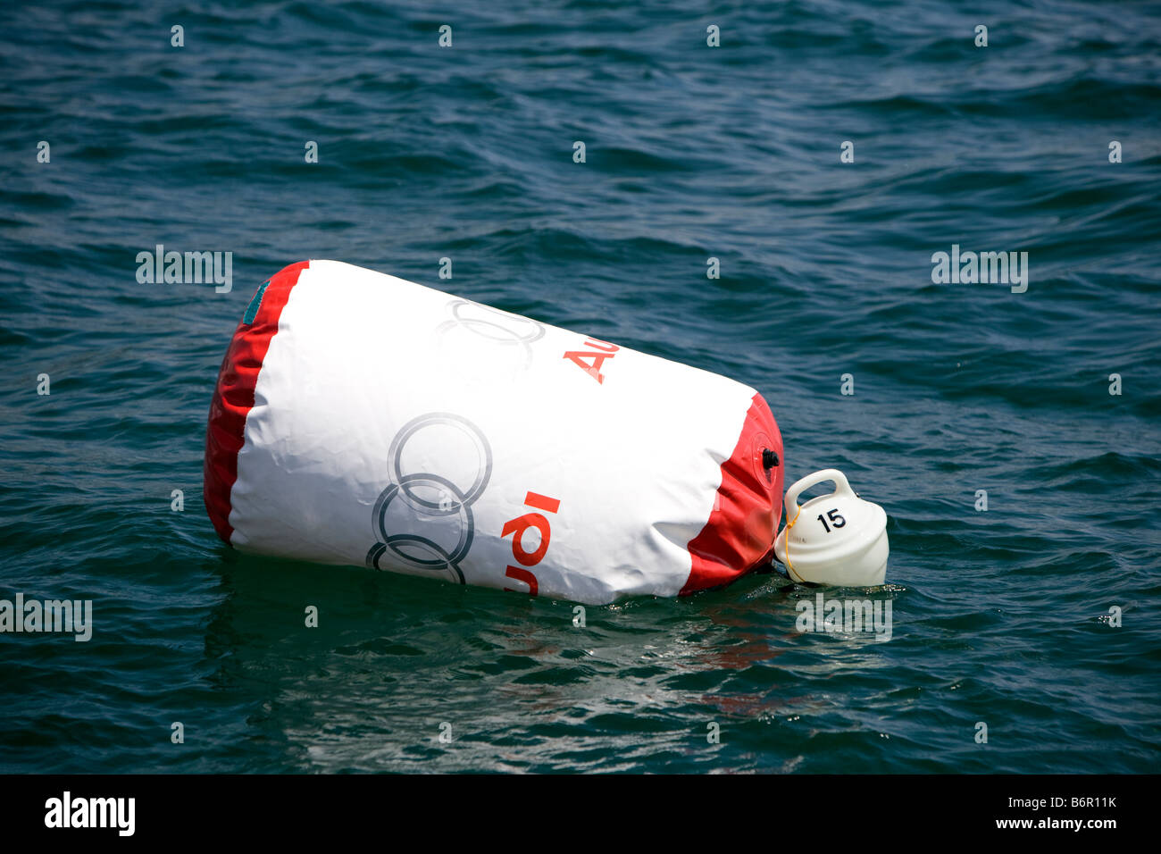 audi branded red and white ships buoy Stock Photo - Alamy