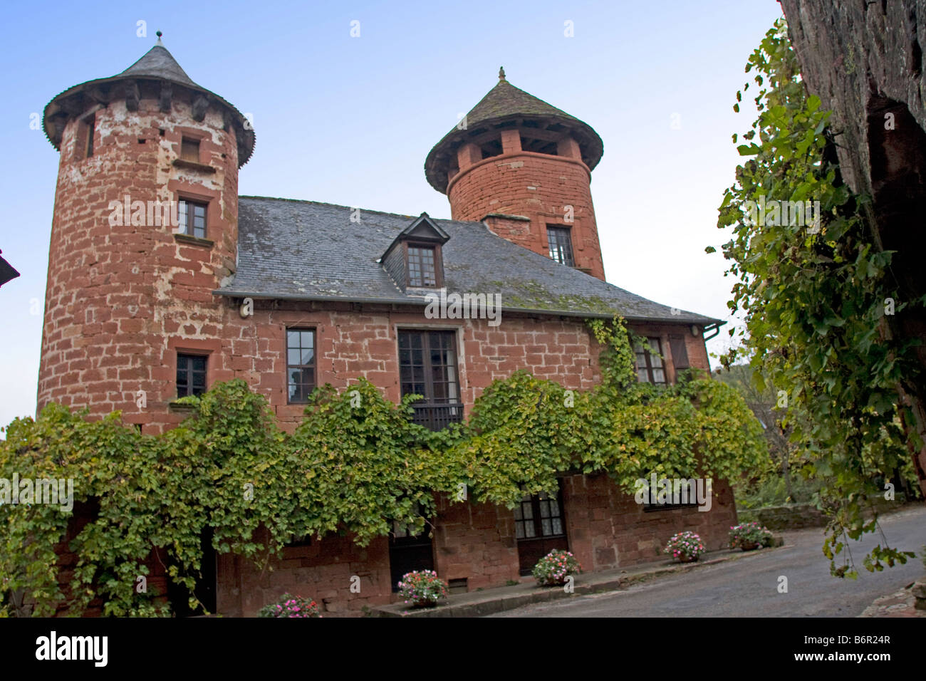 Village of Collonges la Rouge.turrets Blue sky Corrèze Limousin France ...