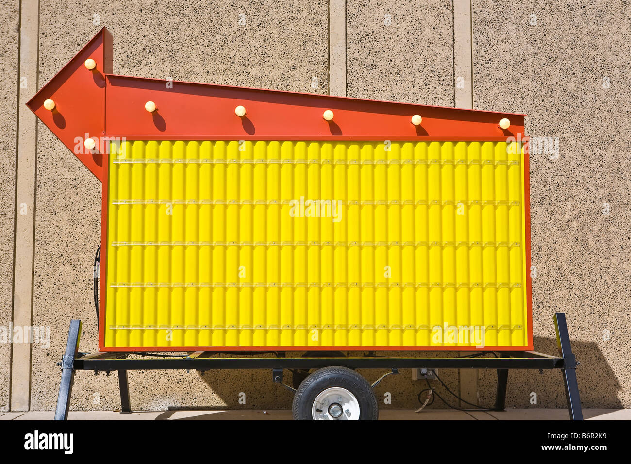 Portable outdoor sign yellow blank sign board with orange arrow Stock ...