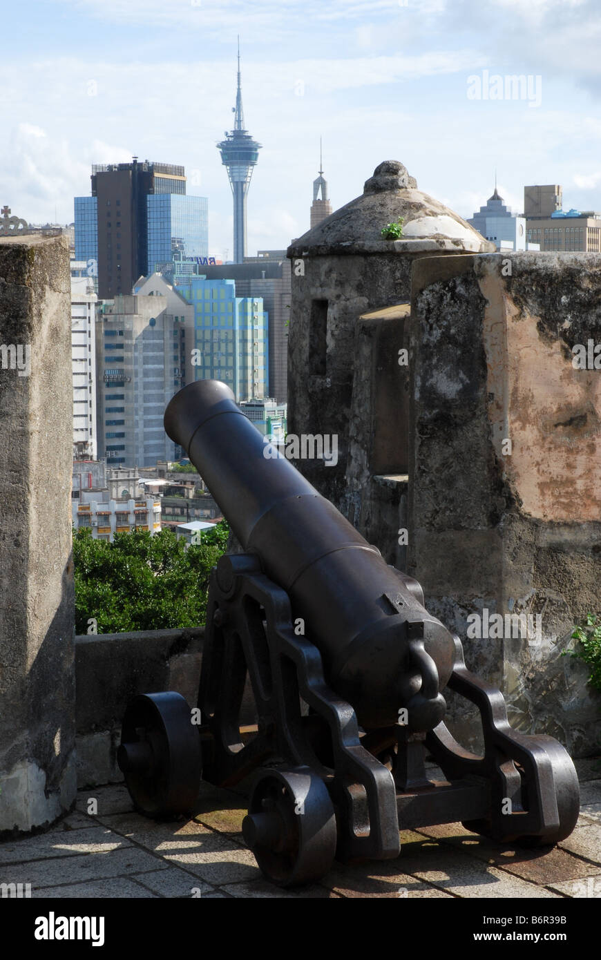 A Portuguese cannon takes aim at Macau Tower Stock Photo - Alamy