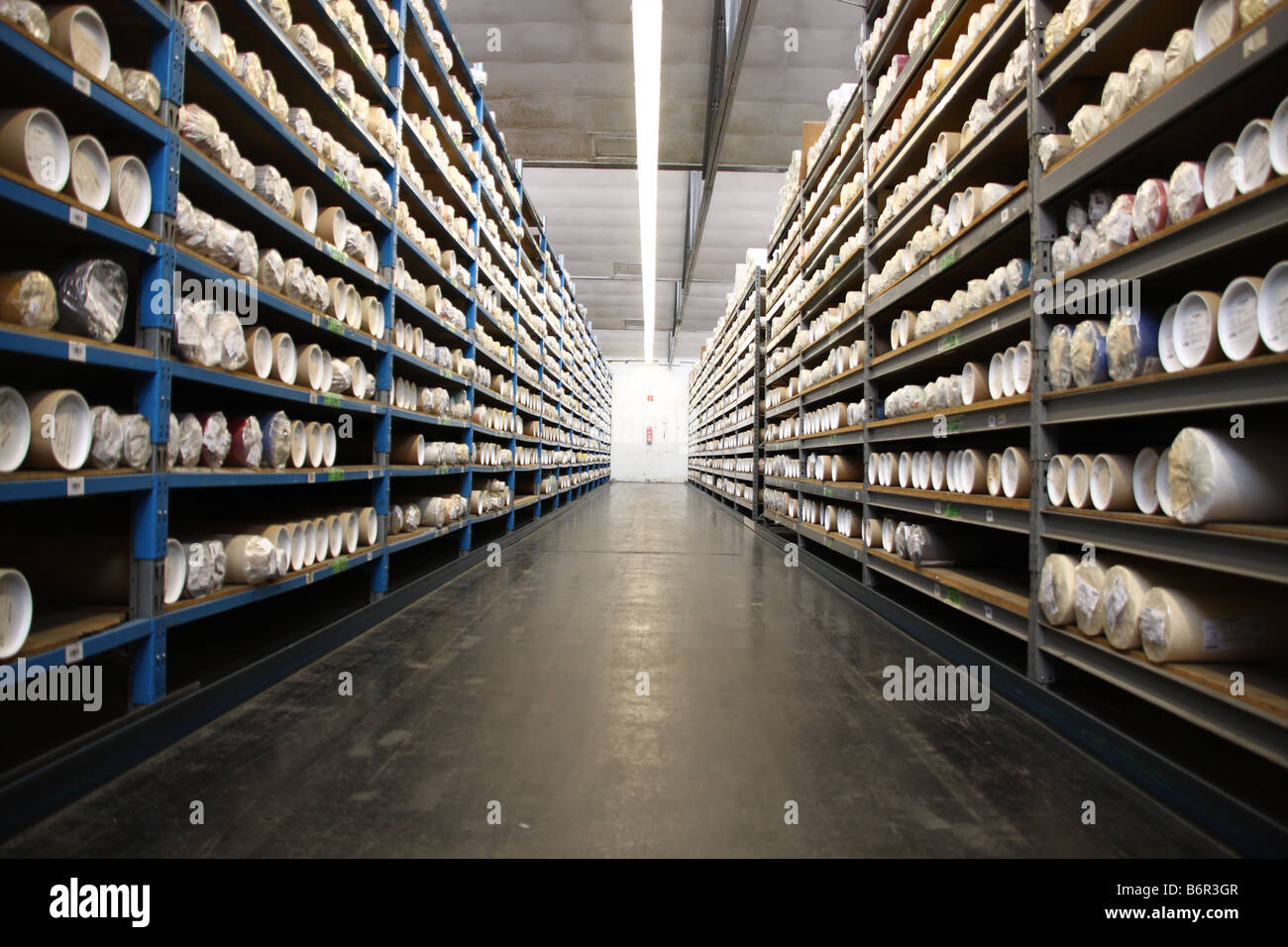 Full shelves in a warehouse Stock Photo - Alamy