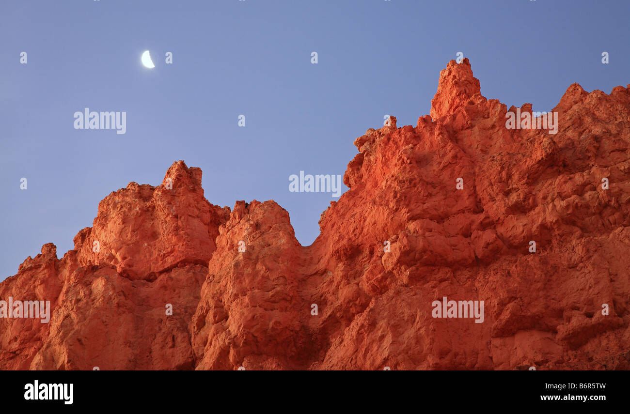 The moon sets behind moving clouds at Bryce National Park Stock Photo ...