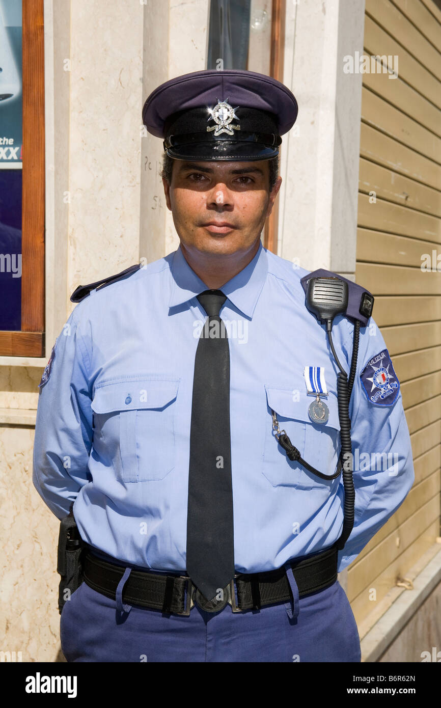 Policeman standing in a street, Valletta, Malta Stock Photo - Alamy