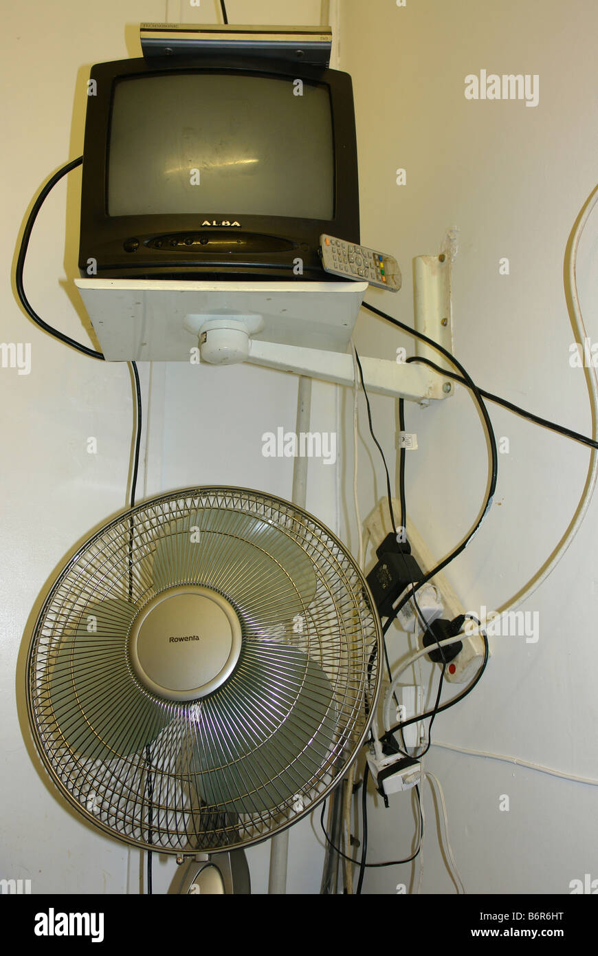 TV Television digital signal box with remote control and electric fan ...