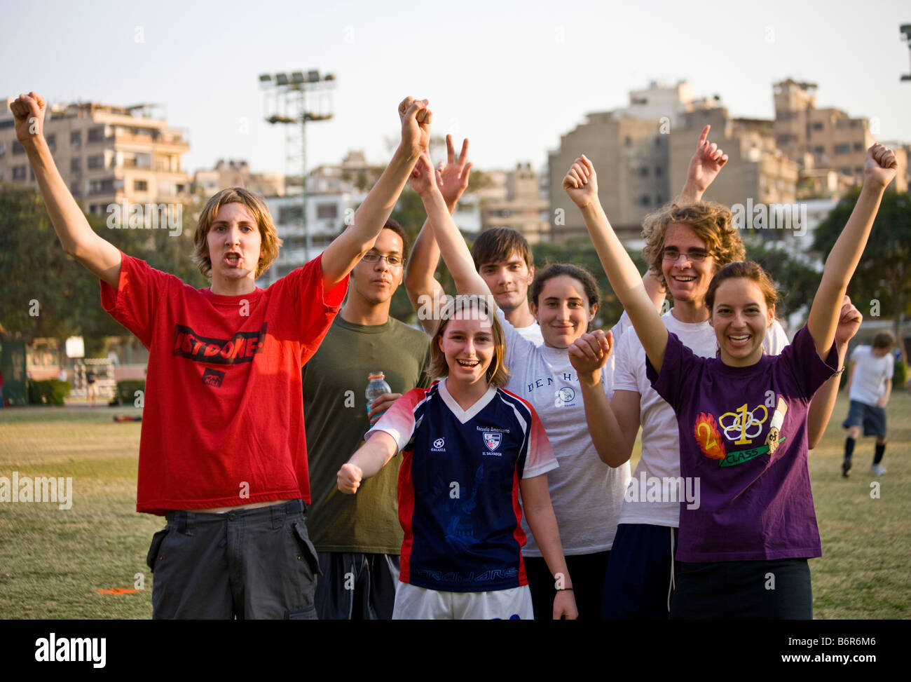 teenagers celebrating victory at football match Stock Photo - Alamy