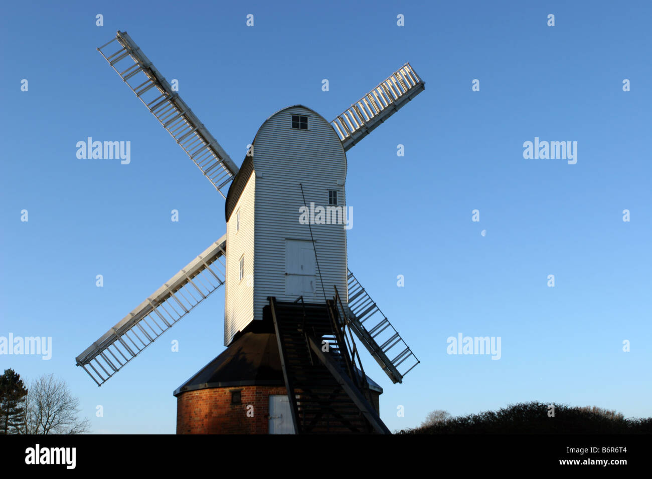 Rear view of Mountnessing Windmill with moon in sky in Brentwood, Essex ...