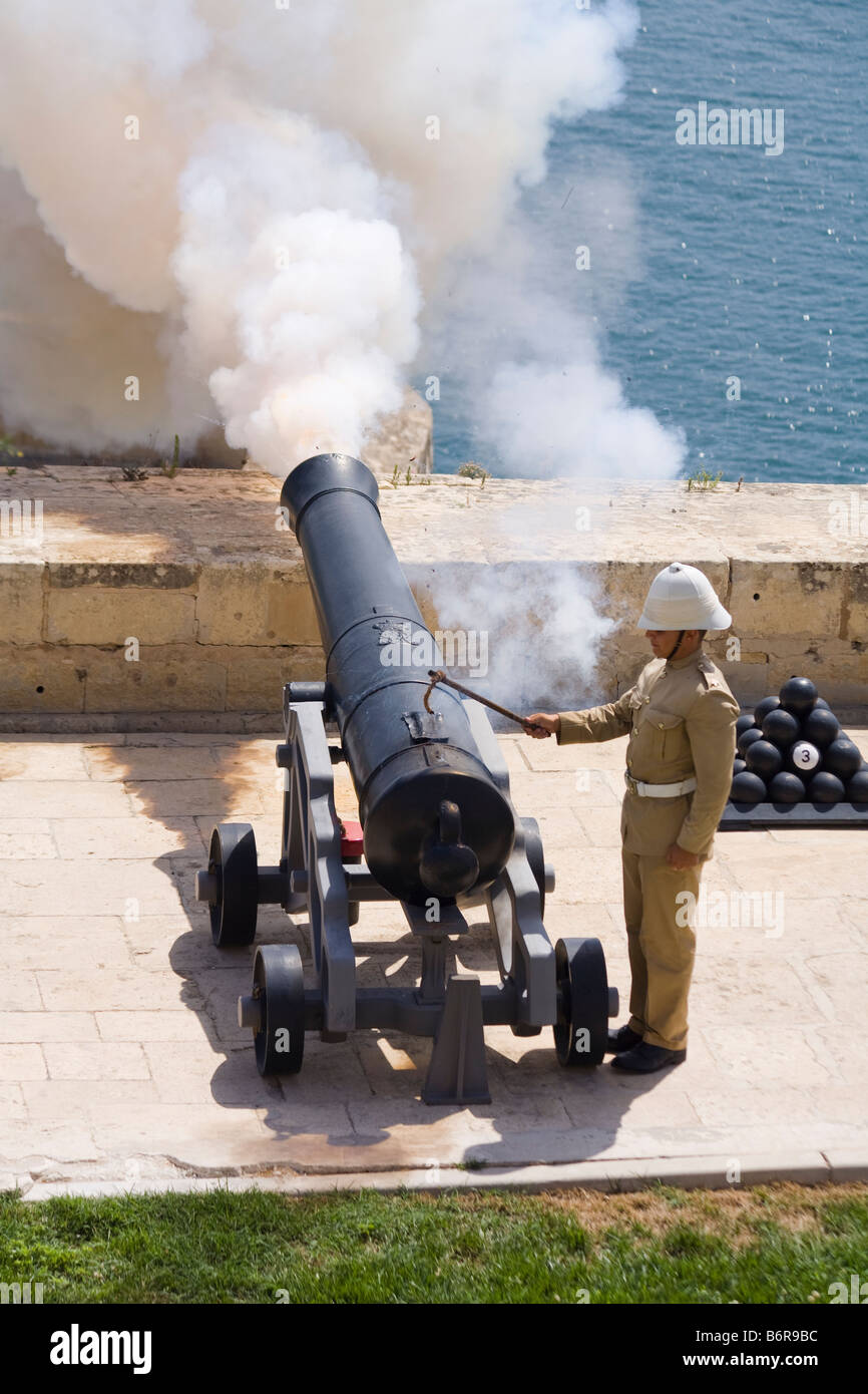Firing of the noon day gun, at the Saluting Battery, Upper Barracca ...