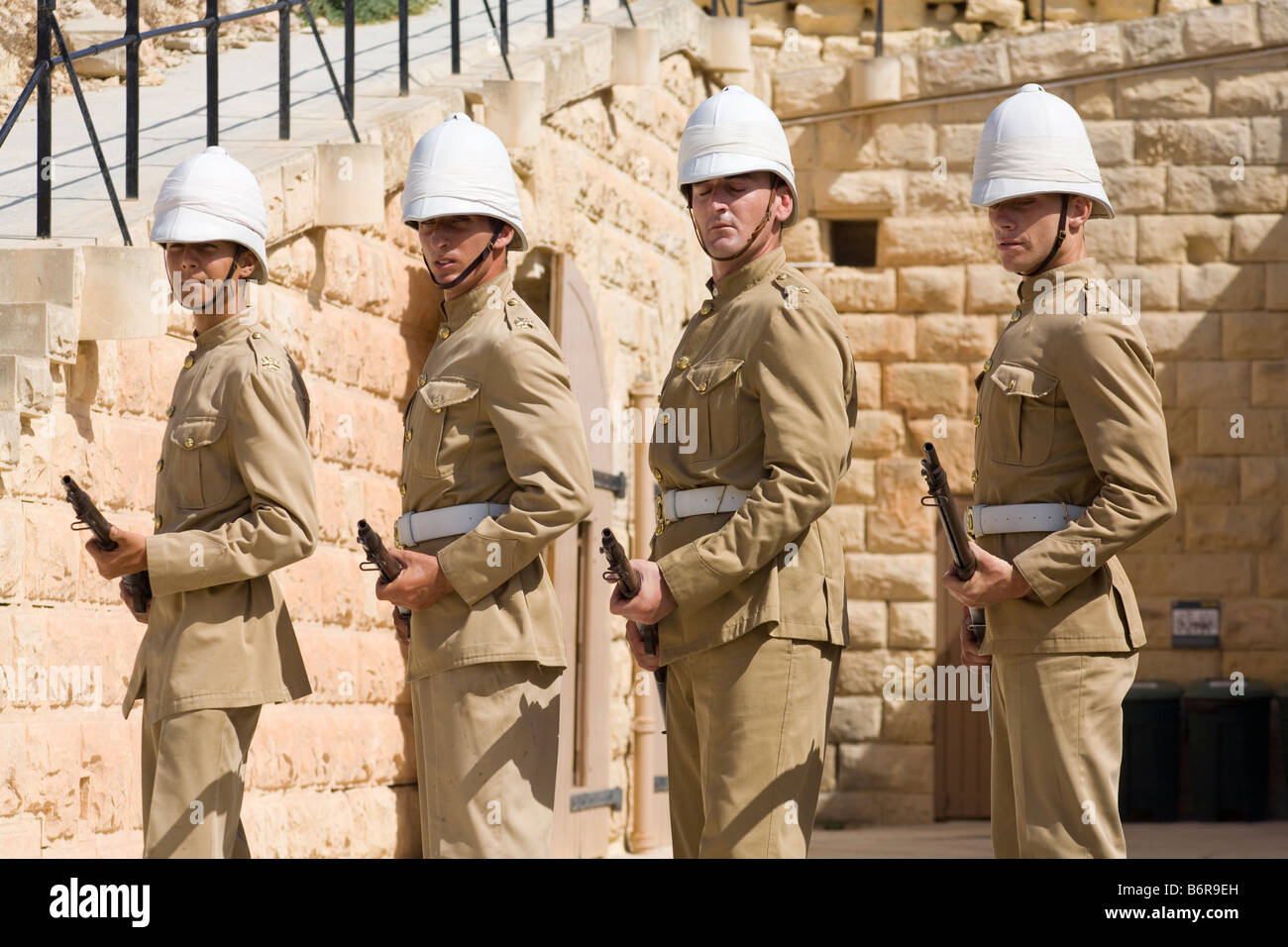 Four soldiers holding their rifles, Fort Rinella, Kalkara, Malta Stock ...