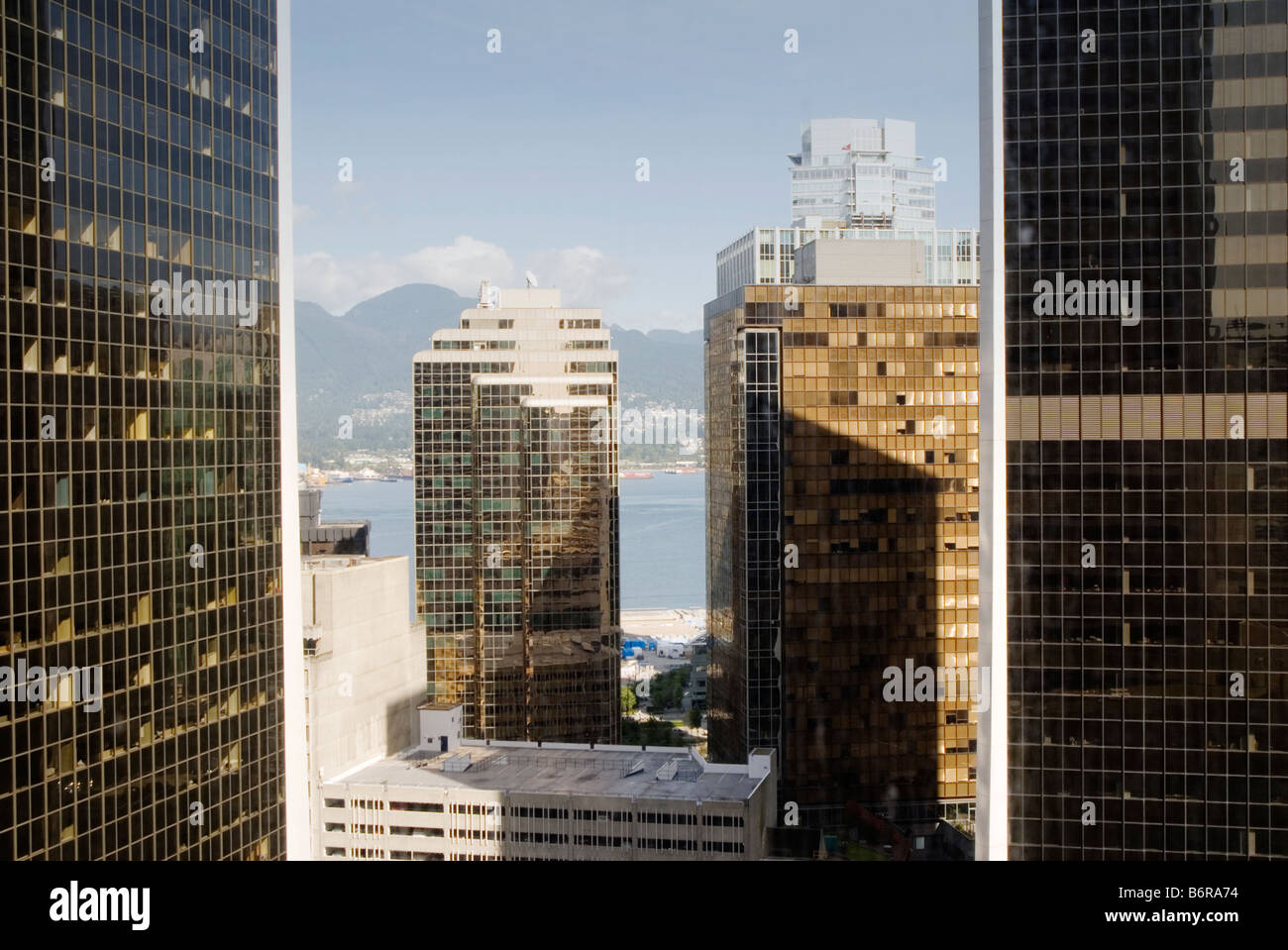 Vancouver, British Columbia and mountains seen through window of ...