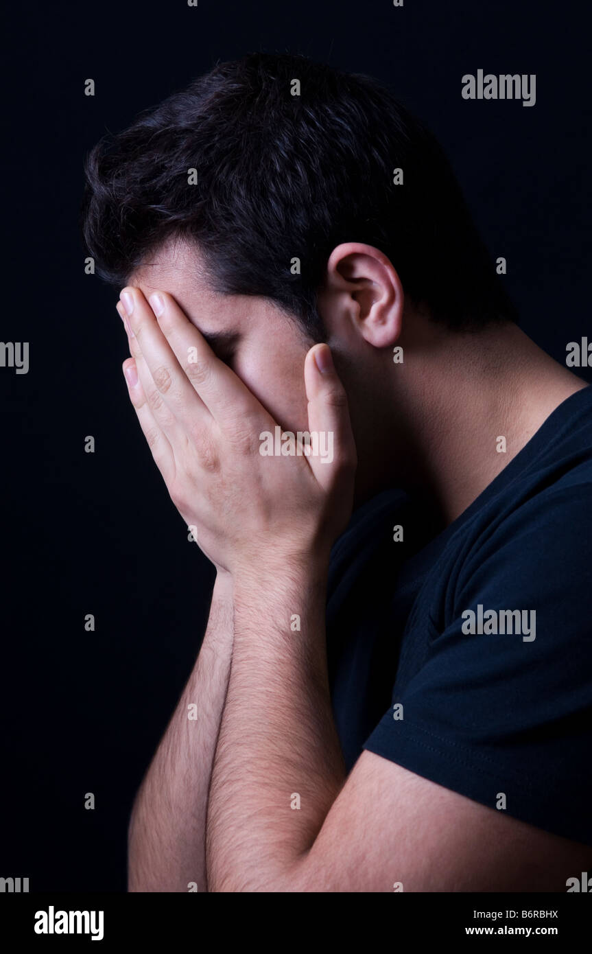 Man head in hands Stock Photo - Alamy