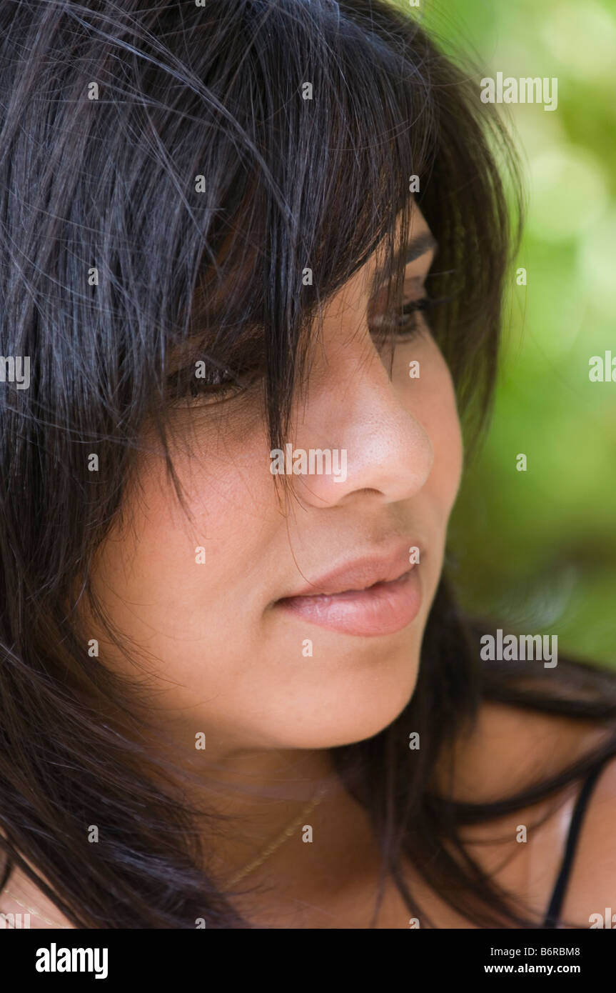 Beautiful woman thinking Stock Photo - Alamy