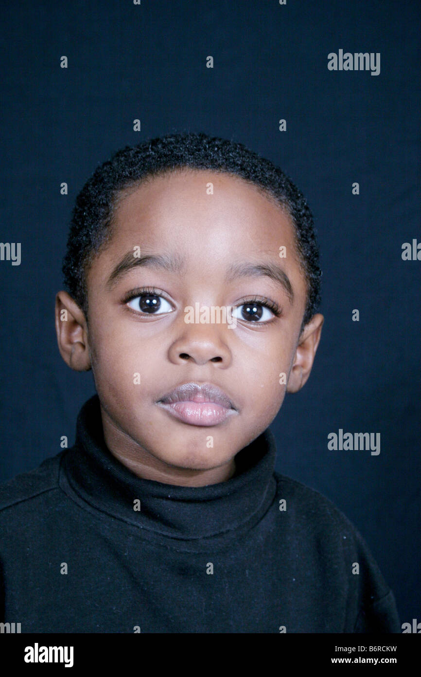 Thinking pondering african american boy hi-res stock photography and ...