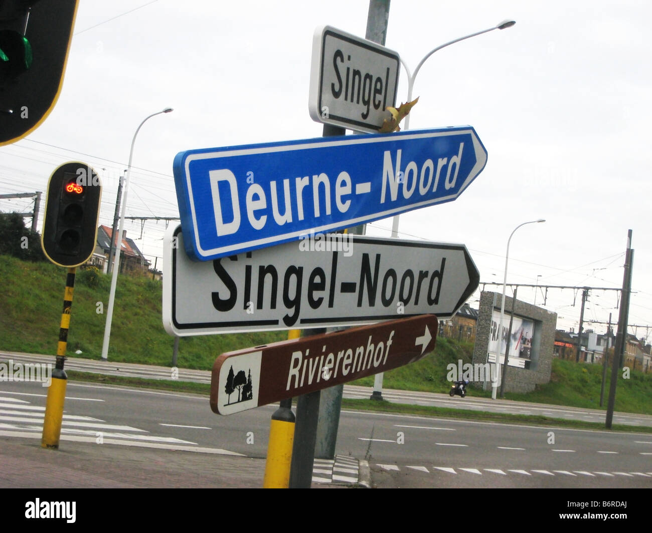 confusing sign posts in town centre of Antwerp Belgium Stock Photo - Alamy