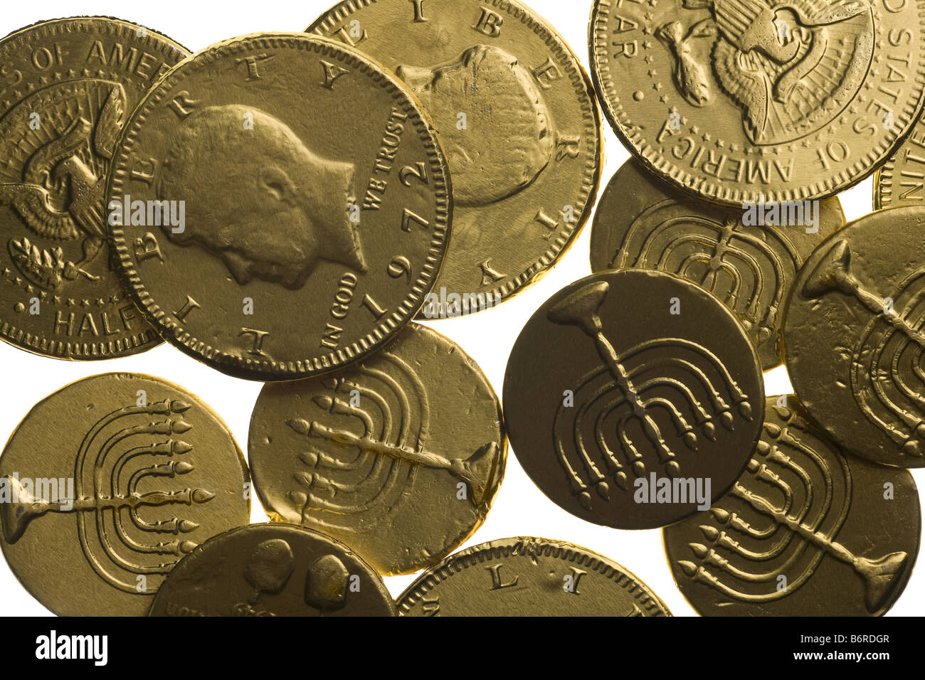 Hanukkah gelt with menorah on back isolated on white Stock Photo - Alamy