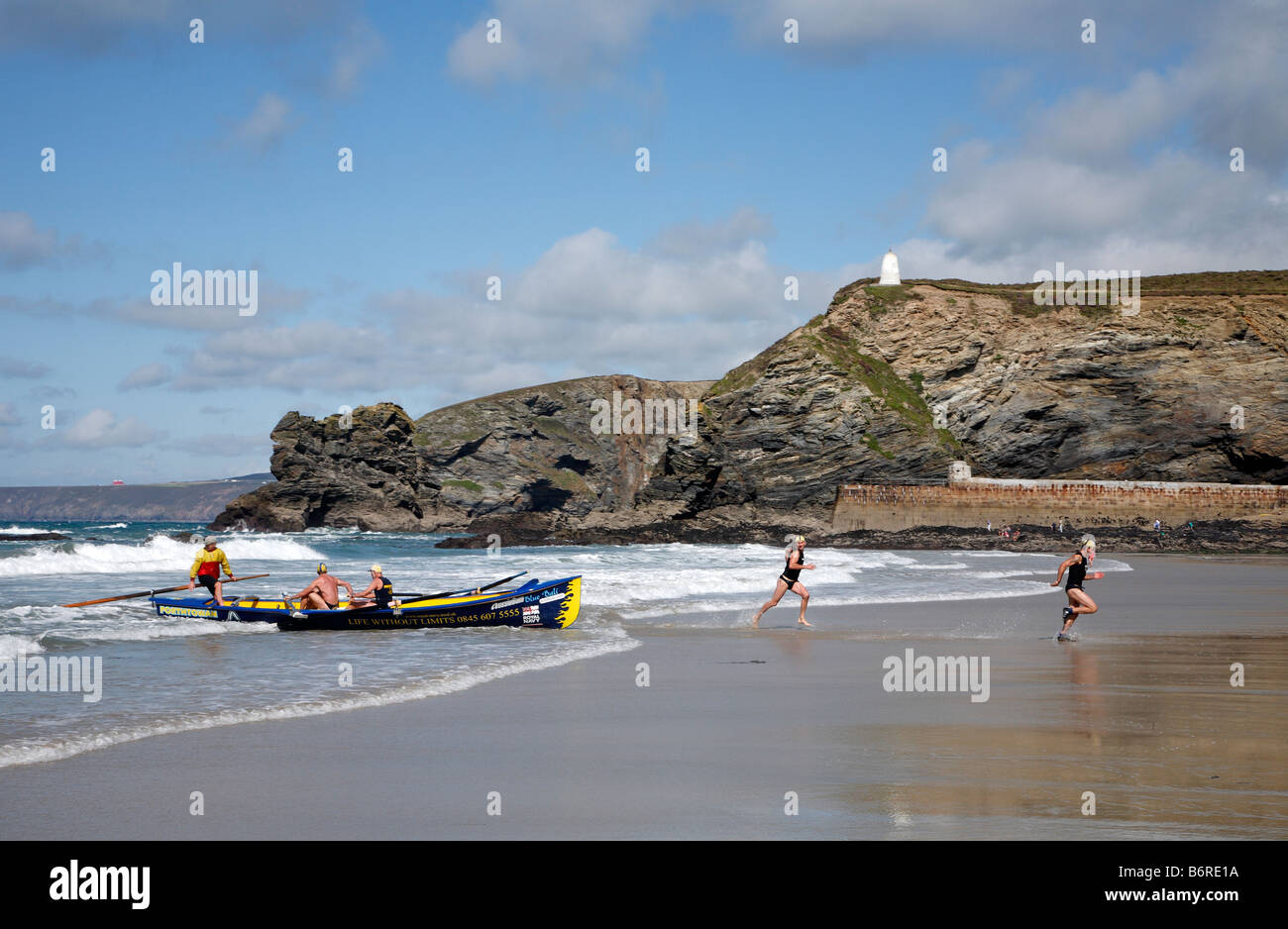 Competitors from the Porthtowan surf boat team finishing a race in ...