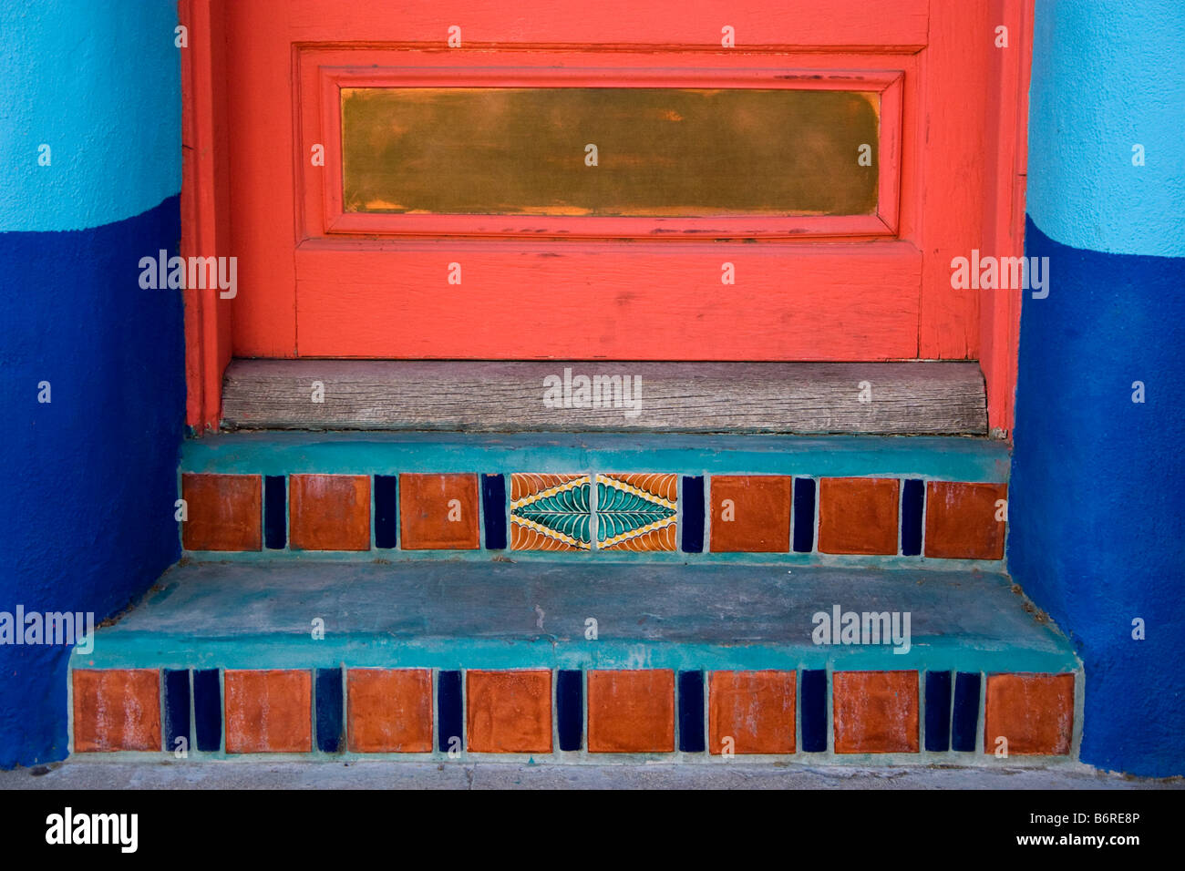 Brightly colored steps in a southwestern pattern at front door of ...