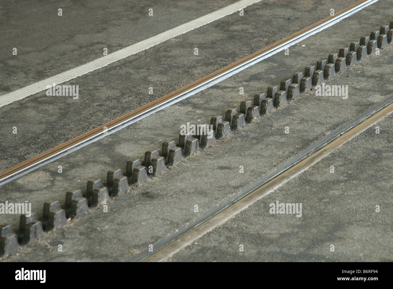 Cog railway track for a mountain train Stock Photo - Alamy