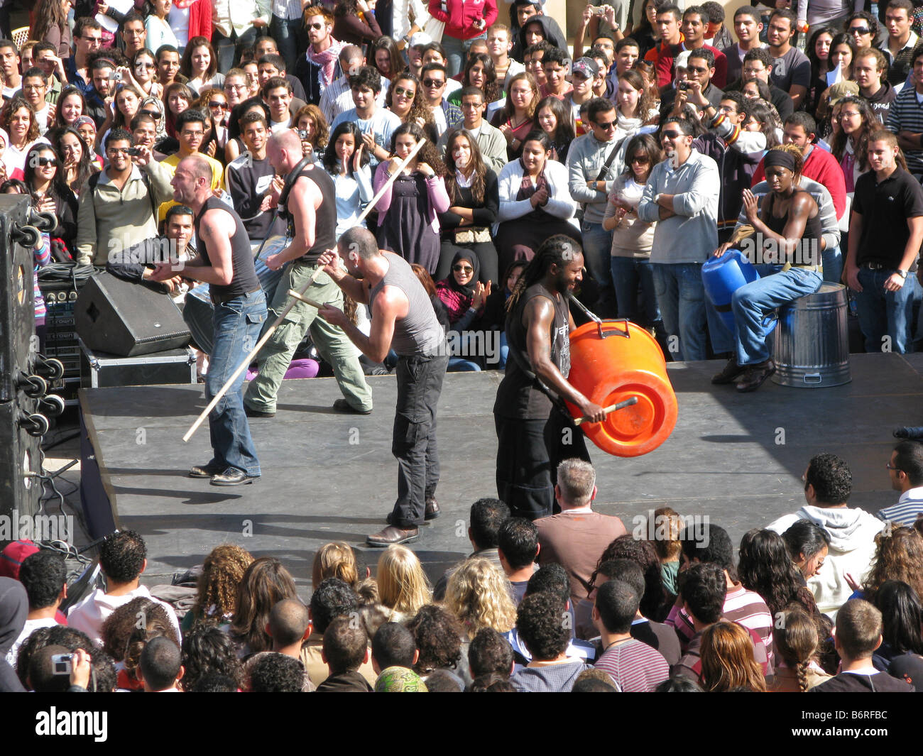 audience watching Stomp cast members performing at the American ...
