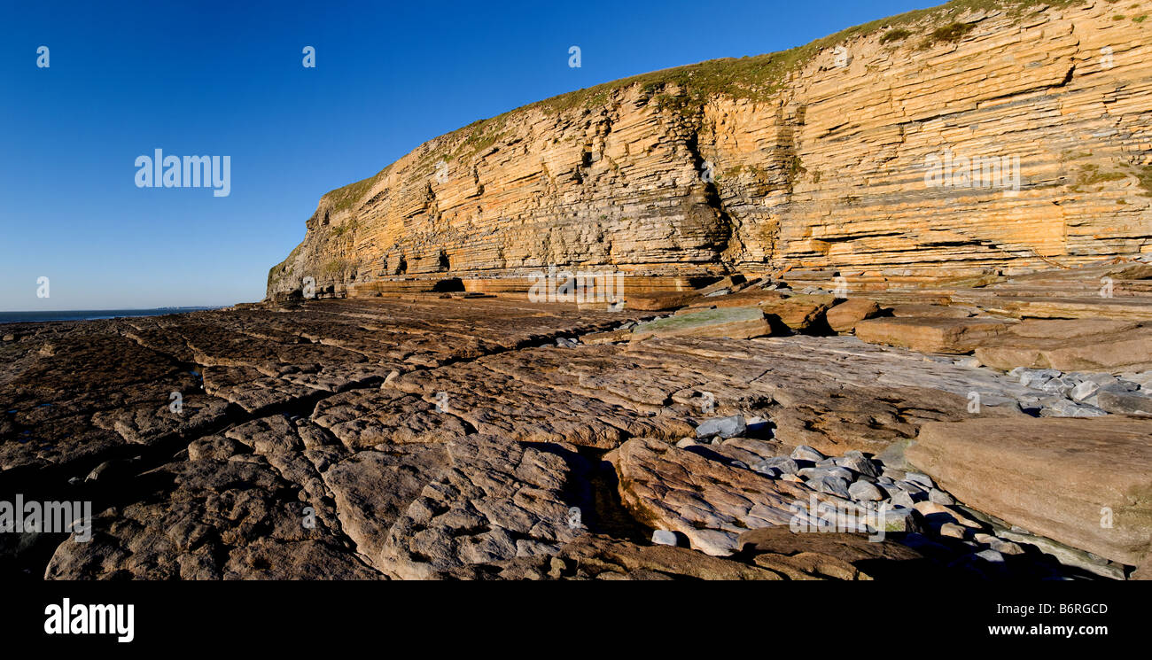 A panoramic view of the sandstone cliffs of Dunraven Bay in South Wales ...