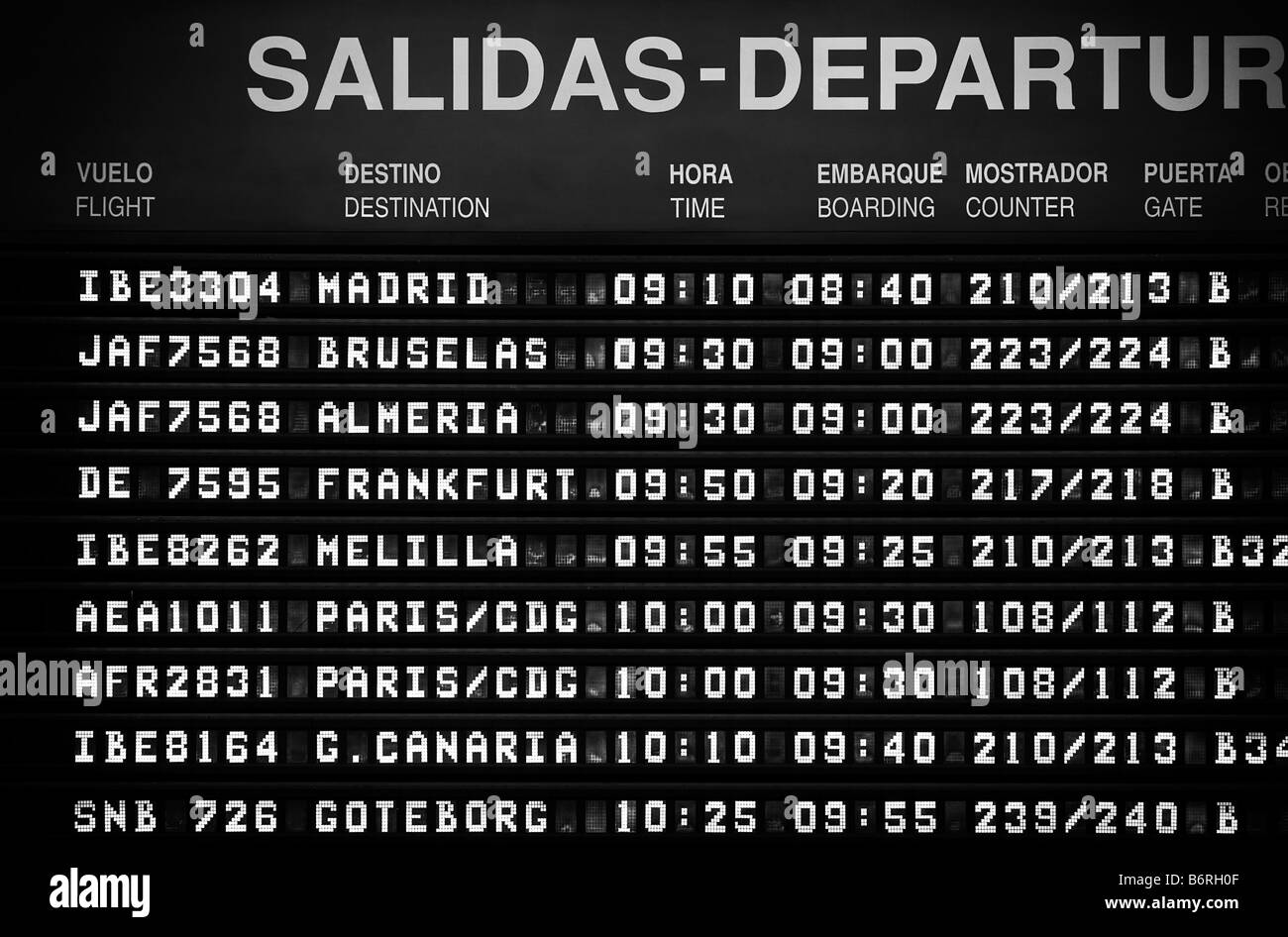 Departure timetable at the airport Stock Photo - Alamy