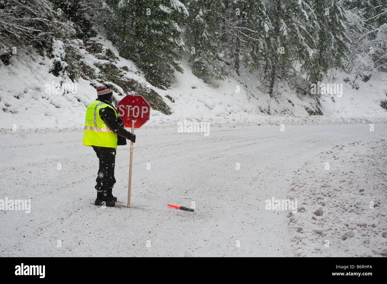 Directing traffic stop sign hi-res stock photography and images - Alamy