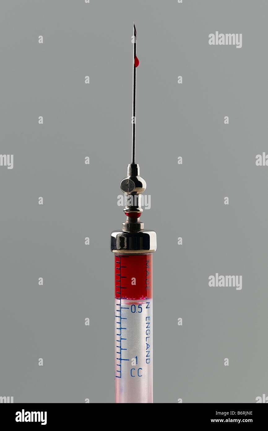 closeup of syringe with a blood drop on needle Stock Photo - Alamy