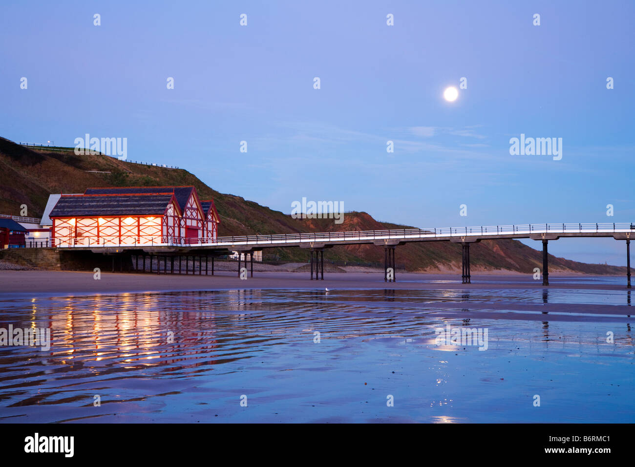 Full Moon setting over Saltburn pier Cleveland England Stock Photo - Alamy