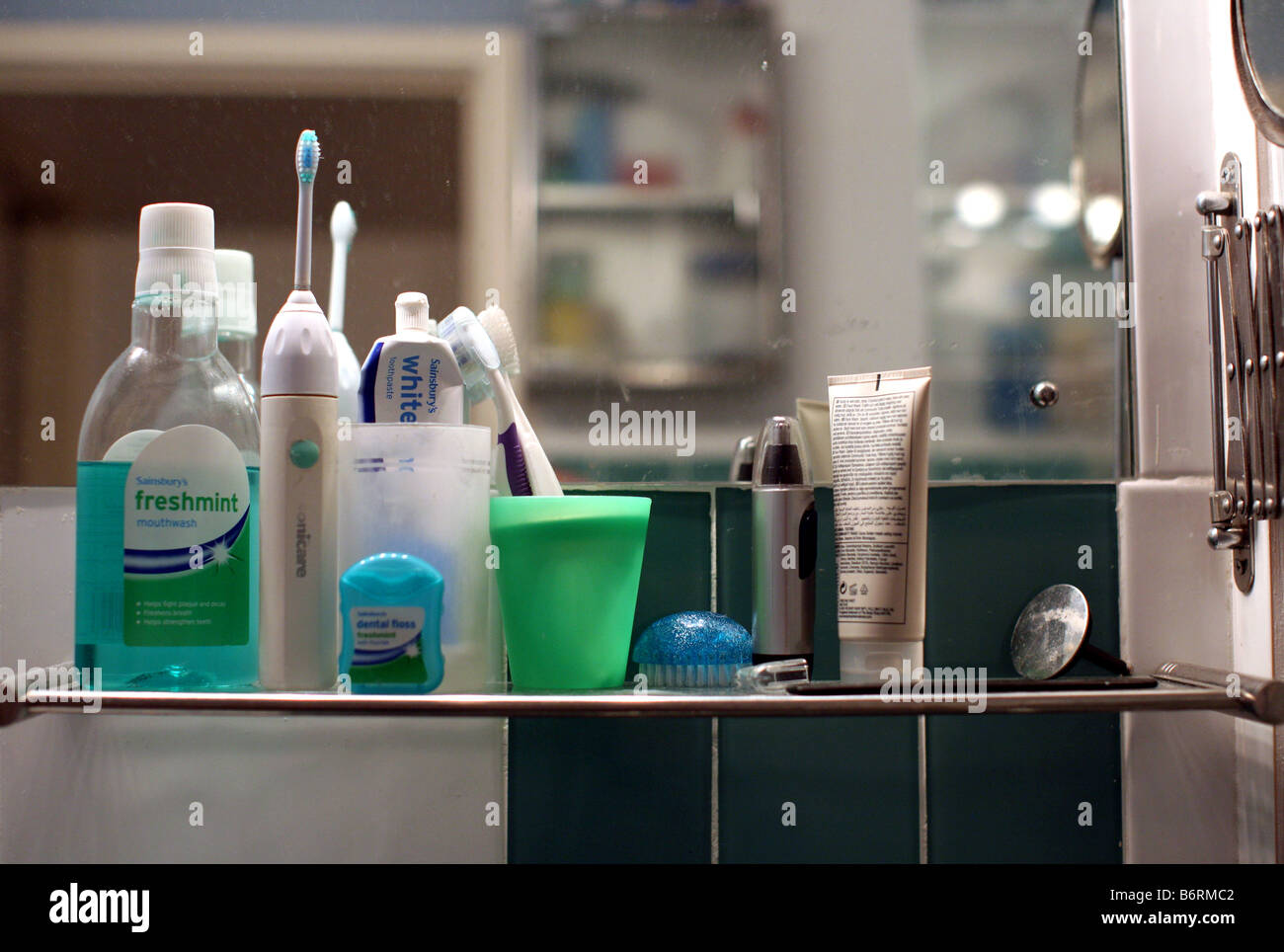 Items on bathroom shelf Stock Photo - Alamy
