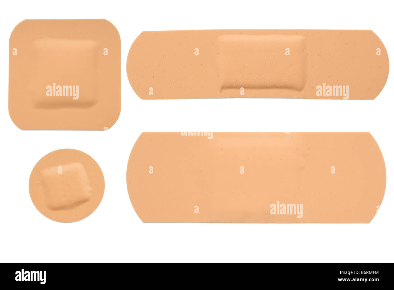 four shapes of adhesive bandage strips on white with clipping path ...