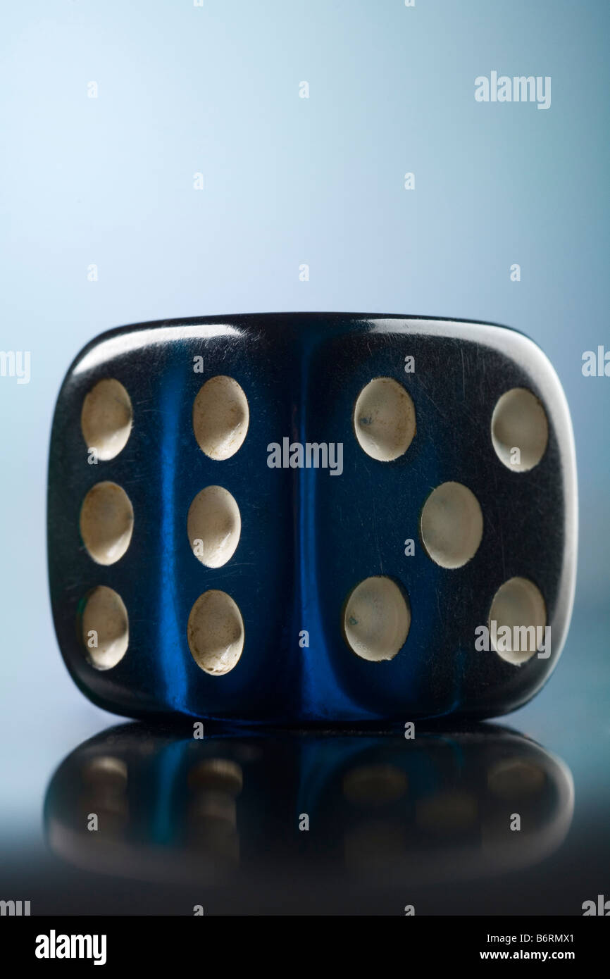 a transparent blue dice on bluish background Stock Photo - Alamy
