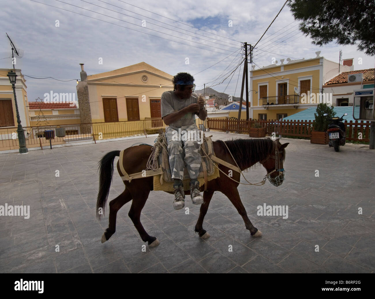 Working donkey on greek island hi-res stock photography and images - Alamy