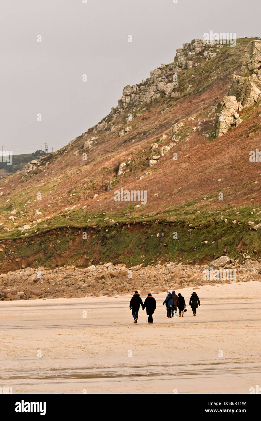 People walking on the beach at Sennen in Cornwall Stock Photo - Alamy