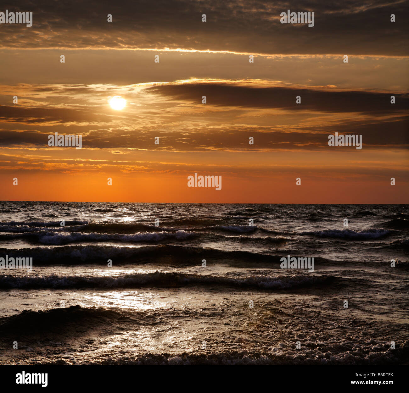 A Dramatic Lake Michigan Sunset At Grand Haven Michigan, USA Stock ...