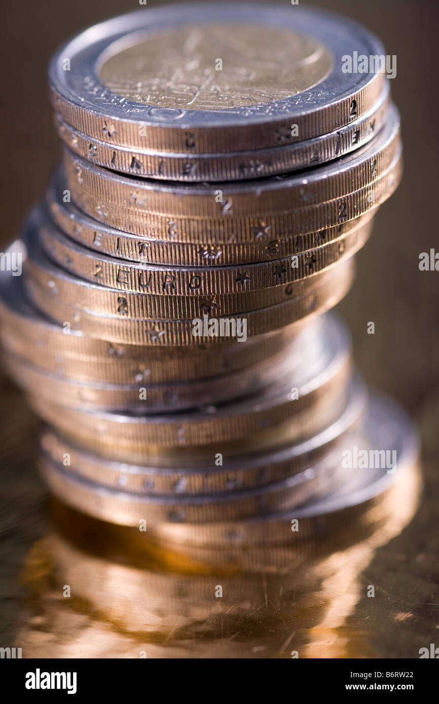 2 euro coins stack with golden reflection Stock Photo - Alamy