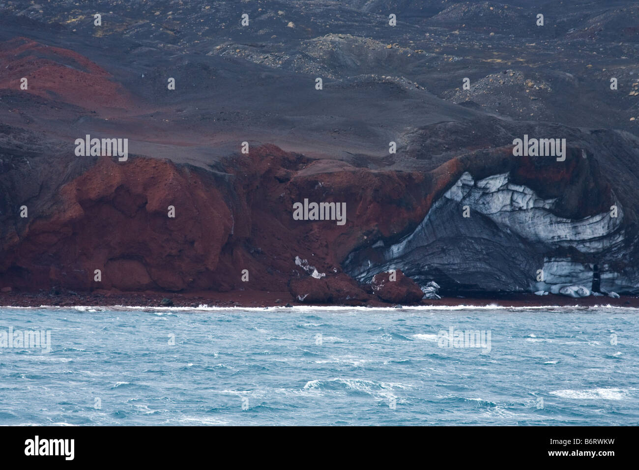 Volcanic rocks and glacial ice mix on shores of Deception Island South ...