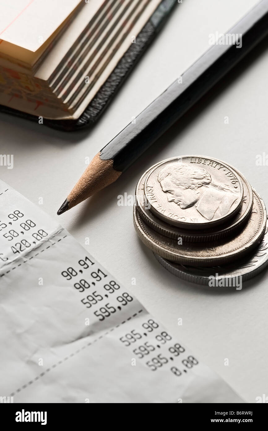 pencil, coins and bills Stock Photo - Alamy