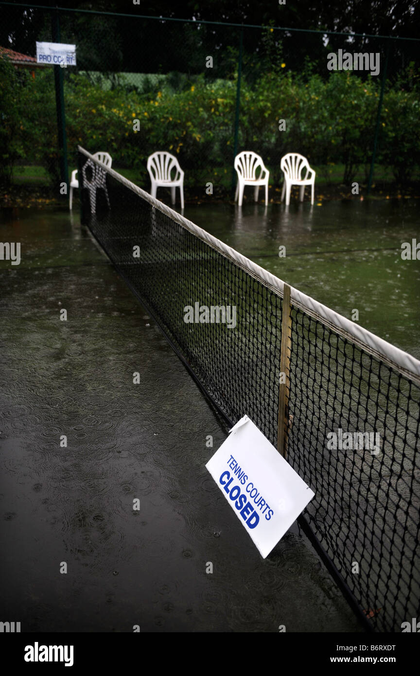A CLOSED TENNIS COURT DUE TO RAIN AT A CARIBBEAN HOLIDAY RESORT Stock ...