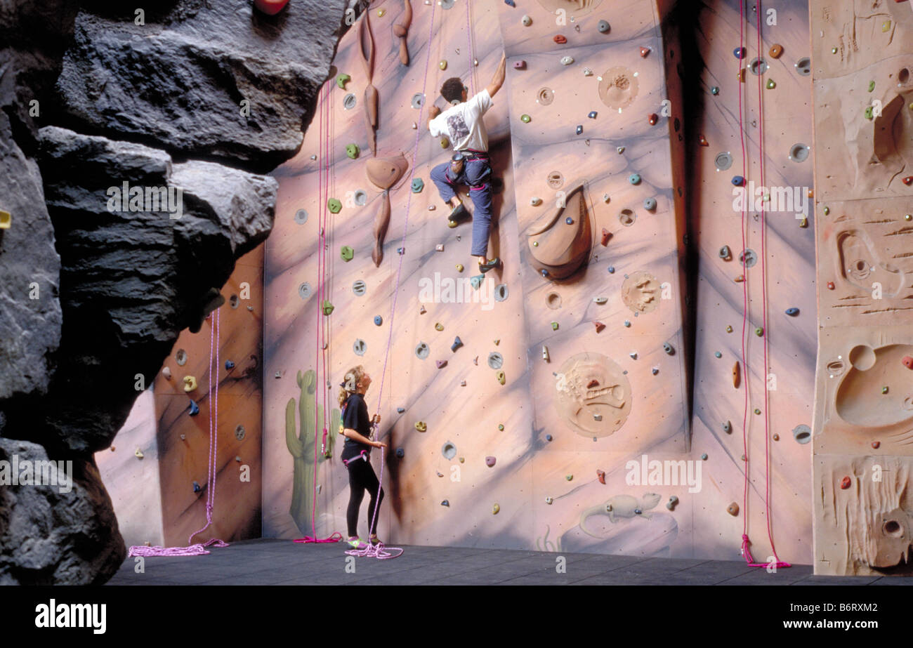 Climbers Climbing on Artificial Indoor Climbing Wall Stock Photo - Alamy