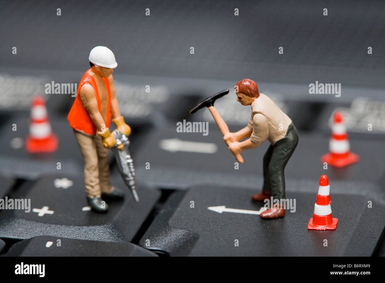 Miniature figures keyboard computer hi-res stock photography and images ...