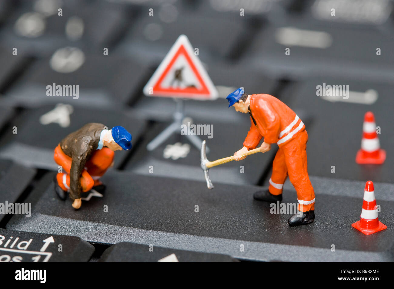 Miniature figures keyboard computer hi-res stock photography and images ...