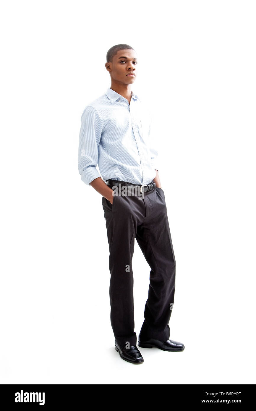 Young African business man standing relaxed and secure with hands in ...