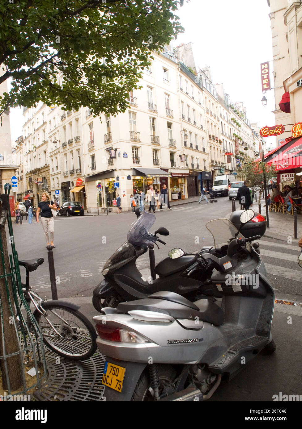 A busy intersection of shops, cafes and bars in the Saint Germain des ...