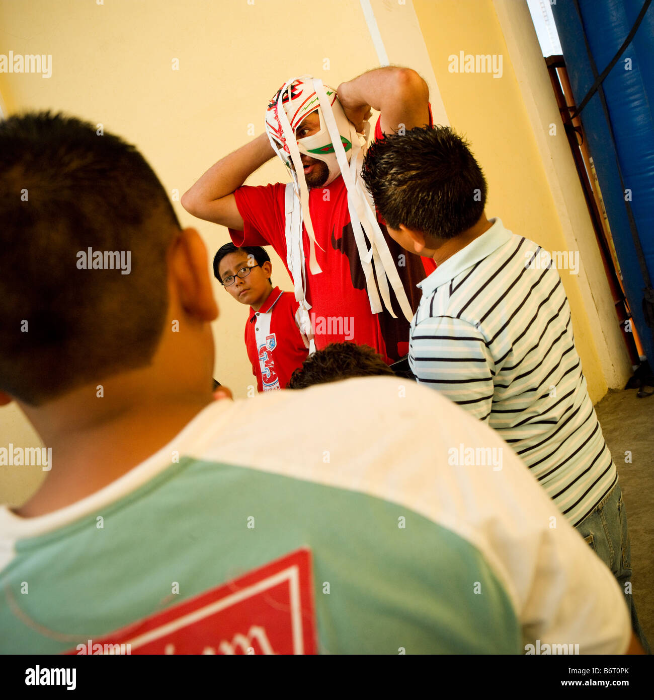lucha libre mexican wrestler with young fans Stock Photo - Alamy