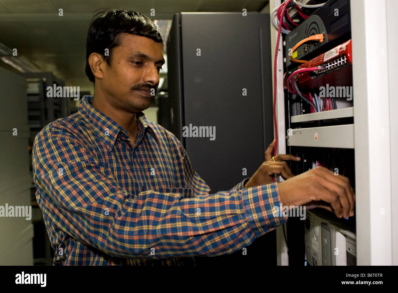 A Indian manager in multinational Information Technology (IT) company ...